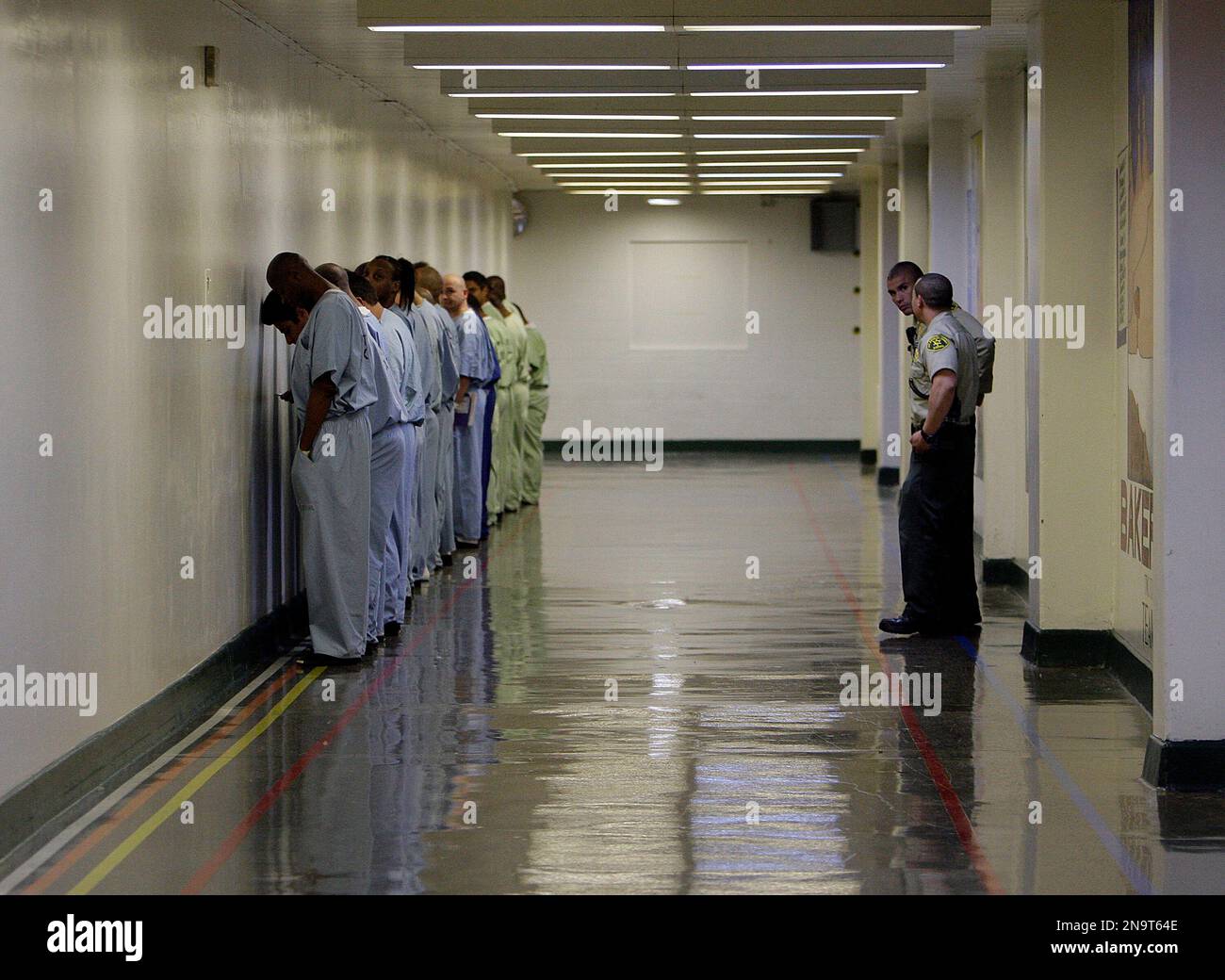 FILE - In this Oct. 27, 2011 photo, a line of inmates is shown in the ...