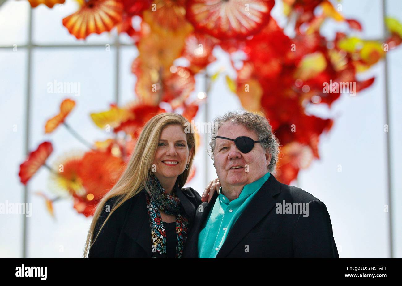 Dale, right, and Leslie Chihuly pose in the "Glasshouse" during a ...