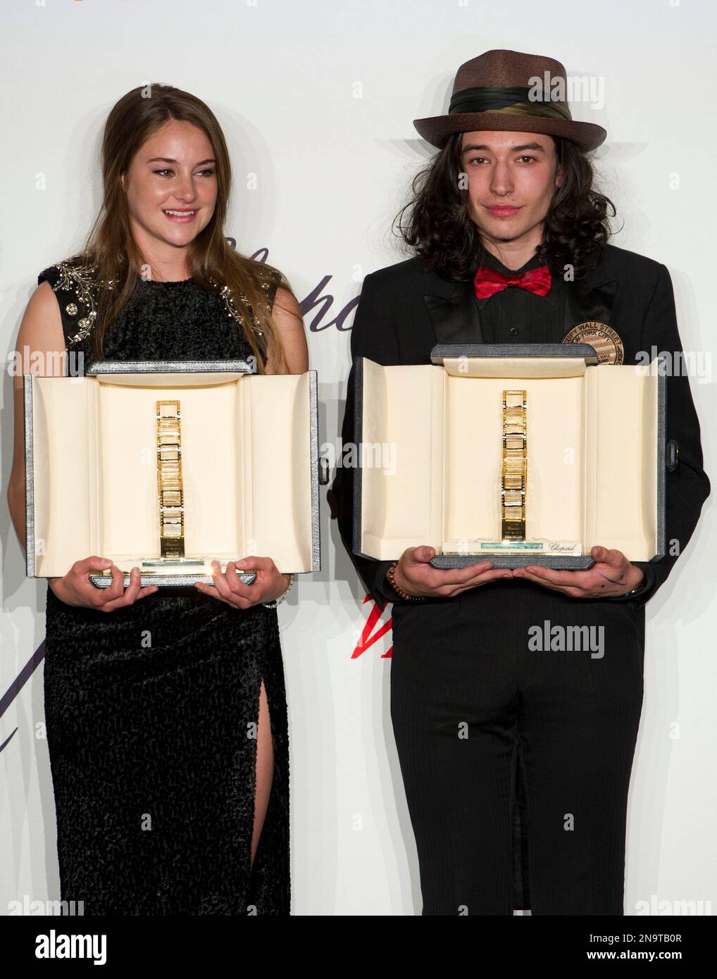 Actors Shailene Woodley, left and Ezra Miller, with their Chopard ...