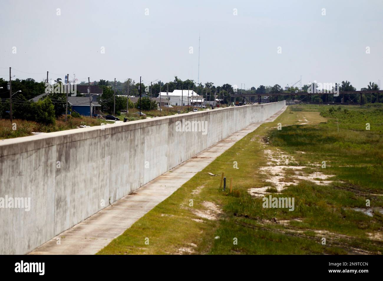 The new levee wall , t-walls with reinforced concrete, is seen from one ...