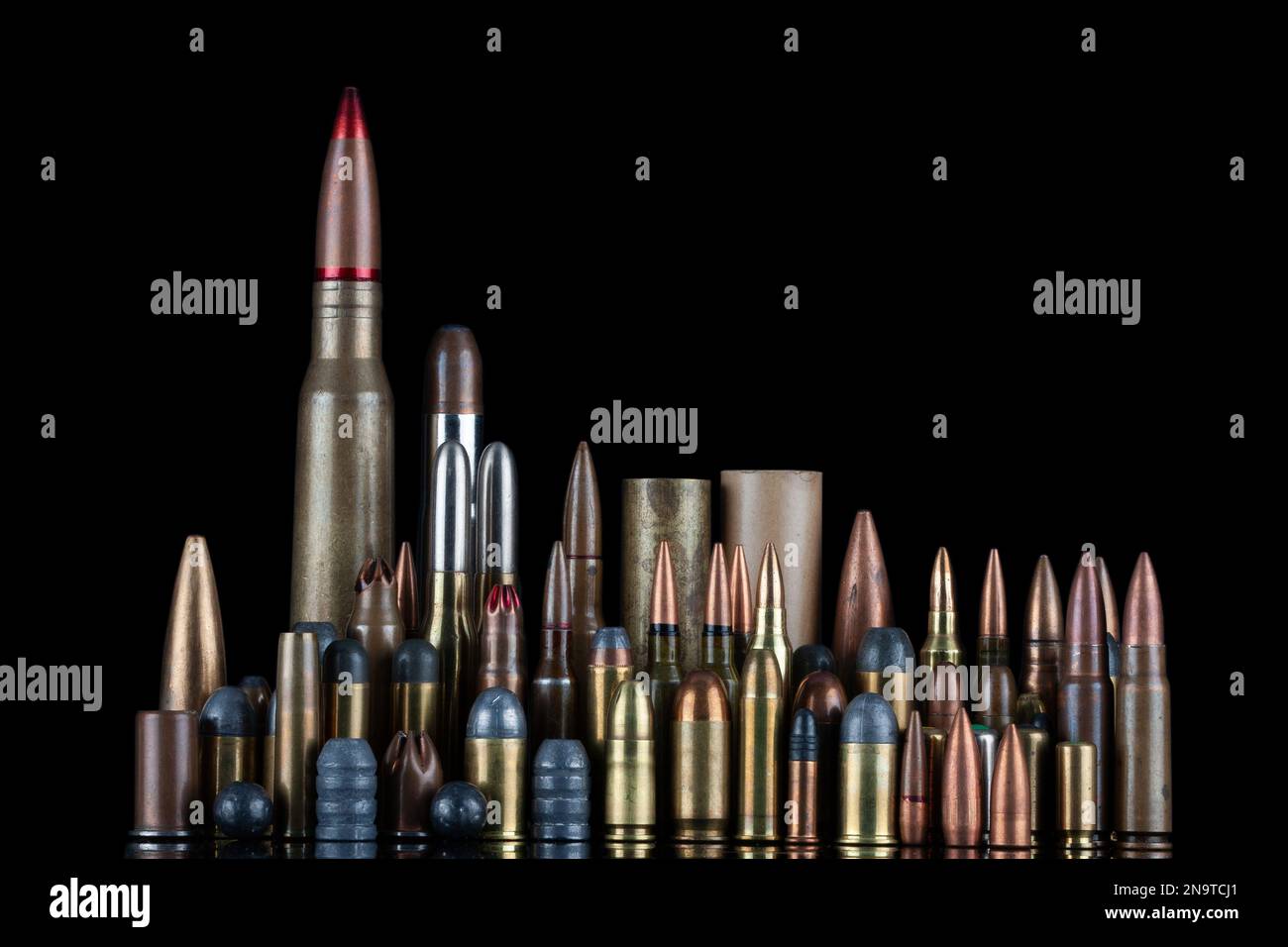 Ammuninition isolated on black background with reflexion. Different ...