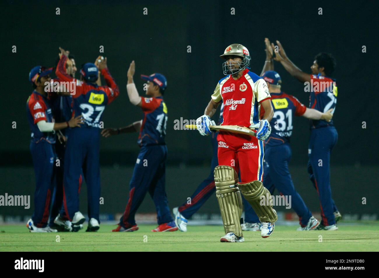 Players of Delhi Daredevils celebrate as Tillakaratne Dilshan of Royal ...
