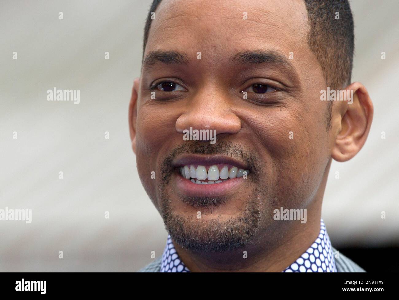 Actor Will Smith poses for the cameras as he arrives for the UK ...
