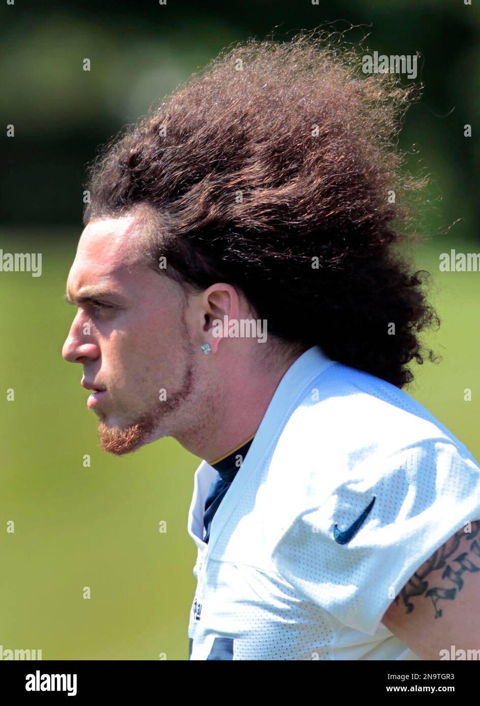 St. Louis Rams linebacker Alex Hoffman-Ellis heads to a drill at the ...