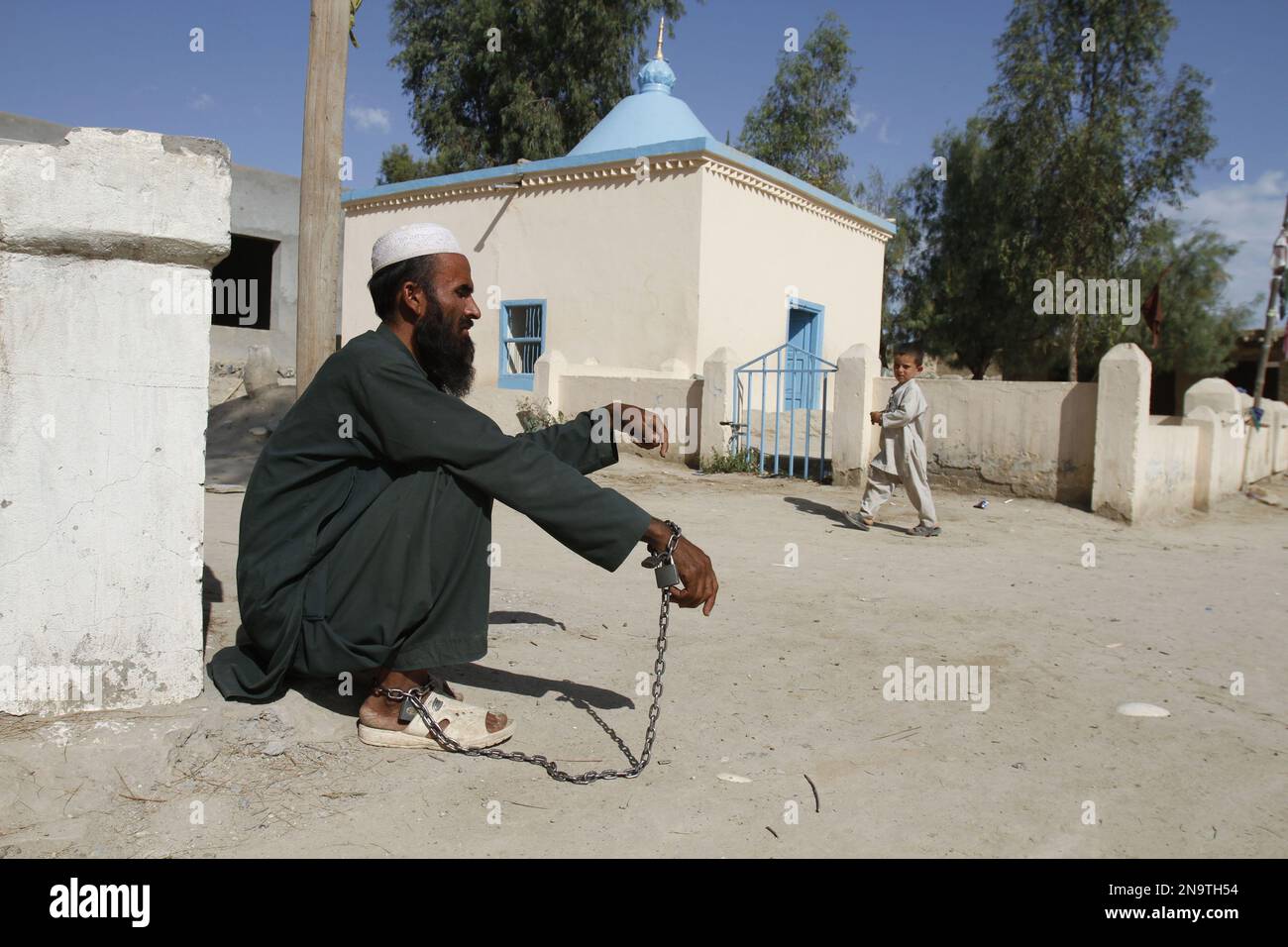 In this Thursday, May 10, 2012 photo, Mohammad Sadeq, 40, who suffers ...