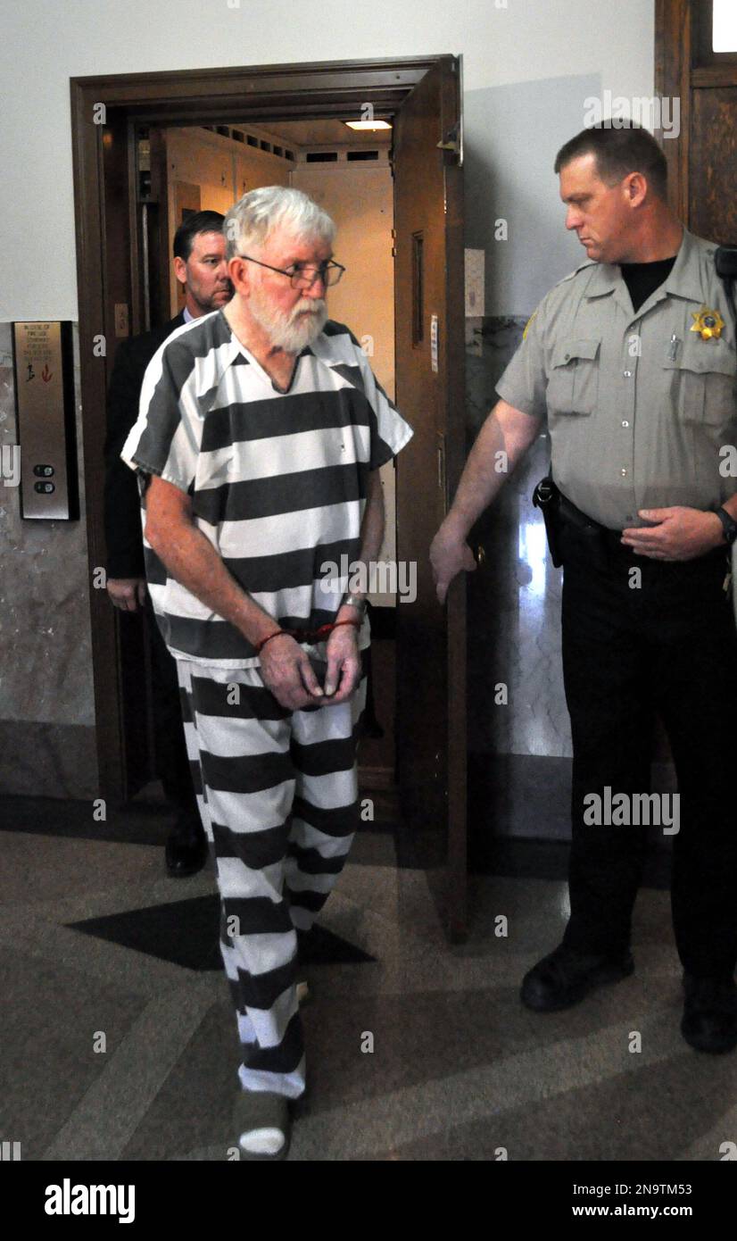 Carl Ericsson, 74, is led into the courtroom before pleading guilty to ...