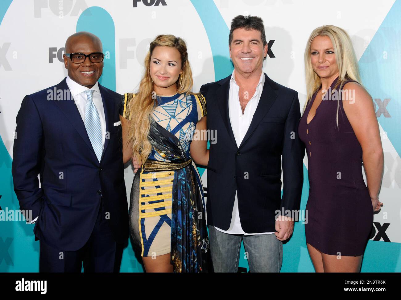 "The X Factor" judges, from left, L.A. Reid, Demi Lovato, Simon Cowell ...