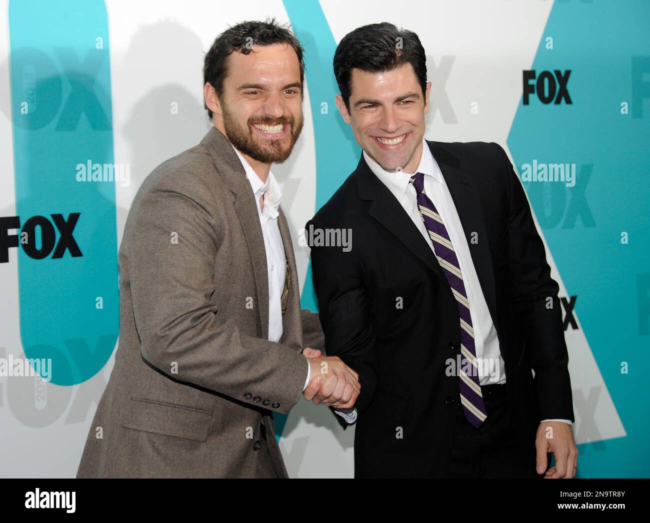 Actor Jake Johnson, left, and Max Greenfield from "New Girl" attend the ...