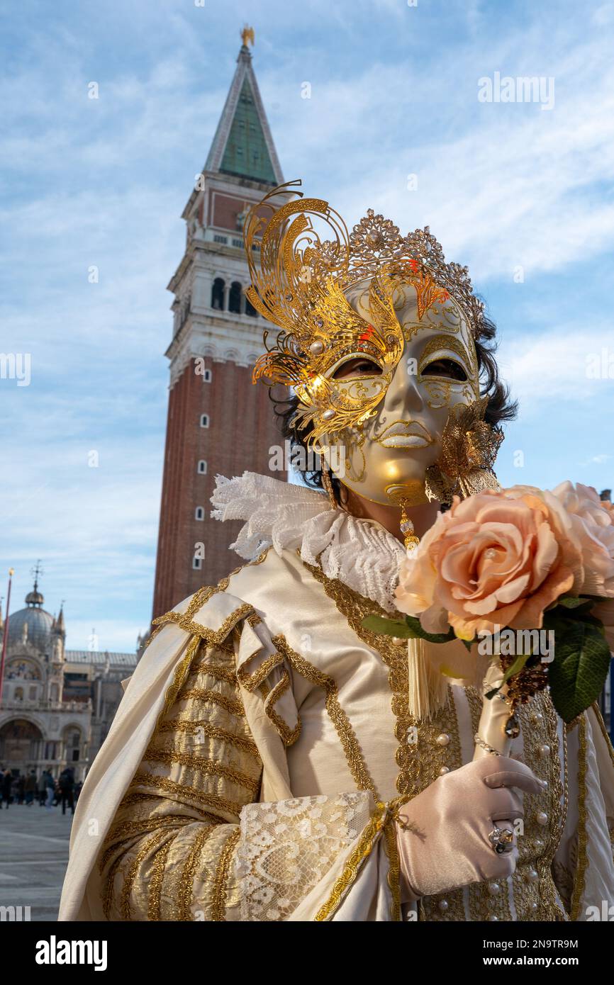 Venice, Italy, 11 February 2023. Masked revellers wearing a traditional ...
