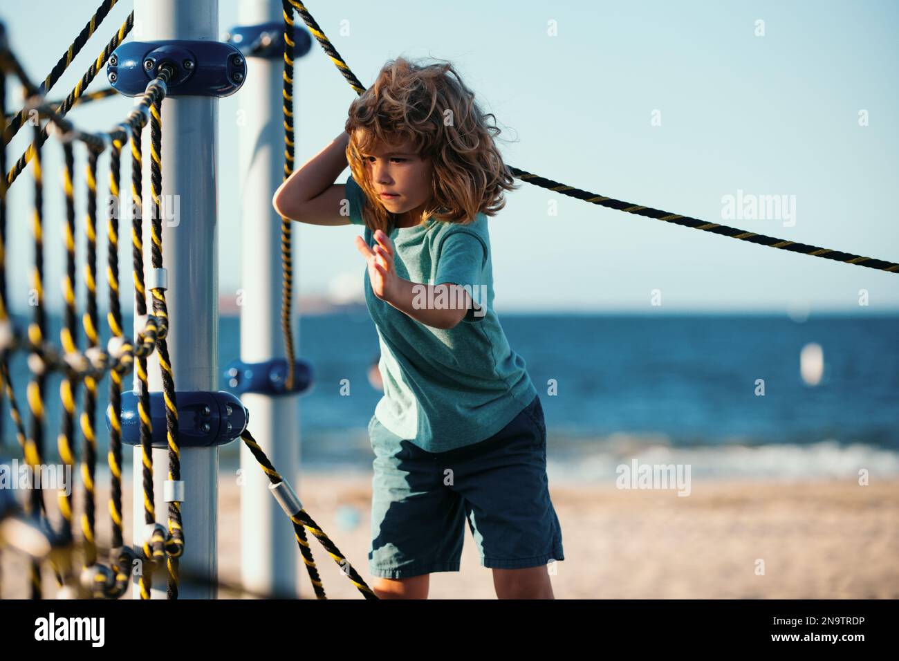 Boy playing in the playground. Kids play outdoor Stock Photo - Alamy