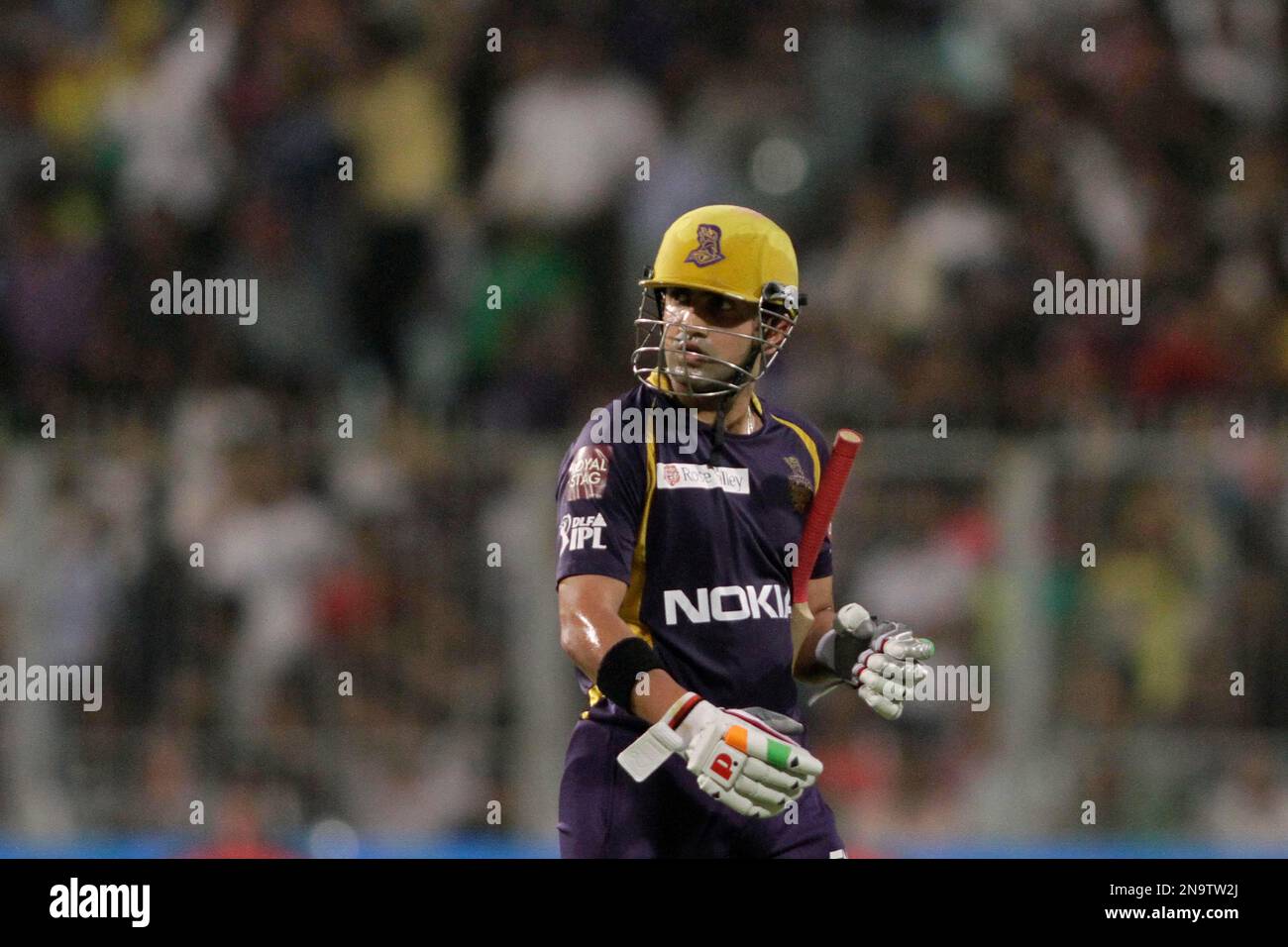 Kolkata Knight Riders' captain Gautam Gambhir looks back as he walks to ...