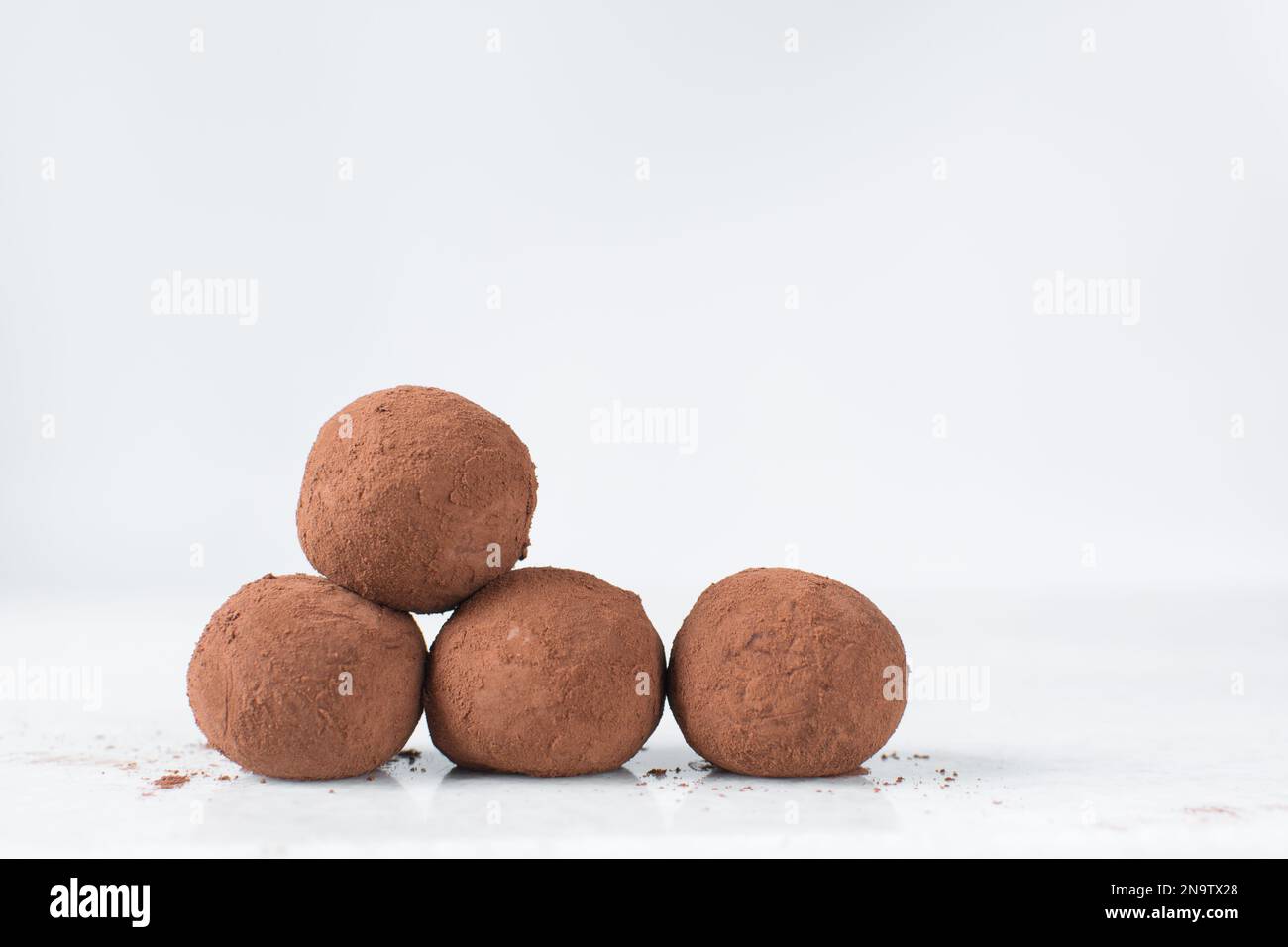 chocolate truffles covered in cocoa powder, homemade chocolate bonbons ...