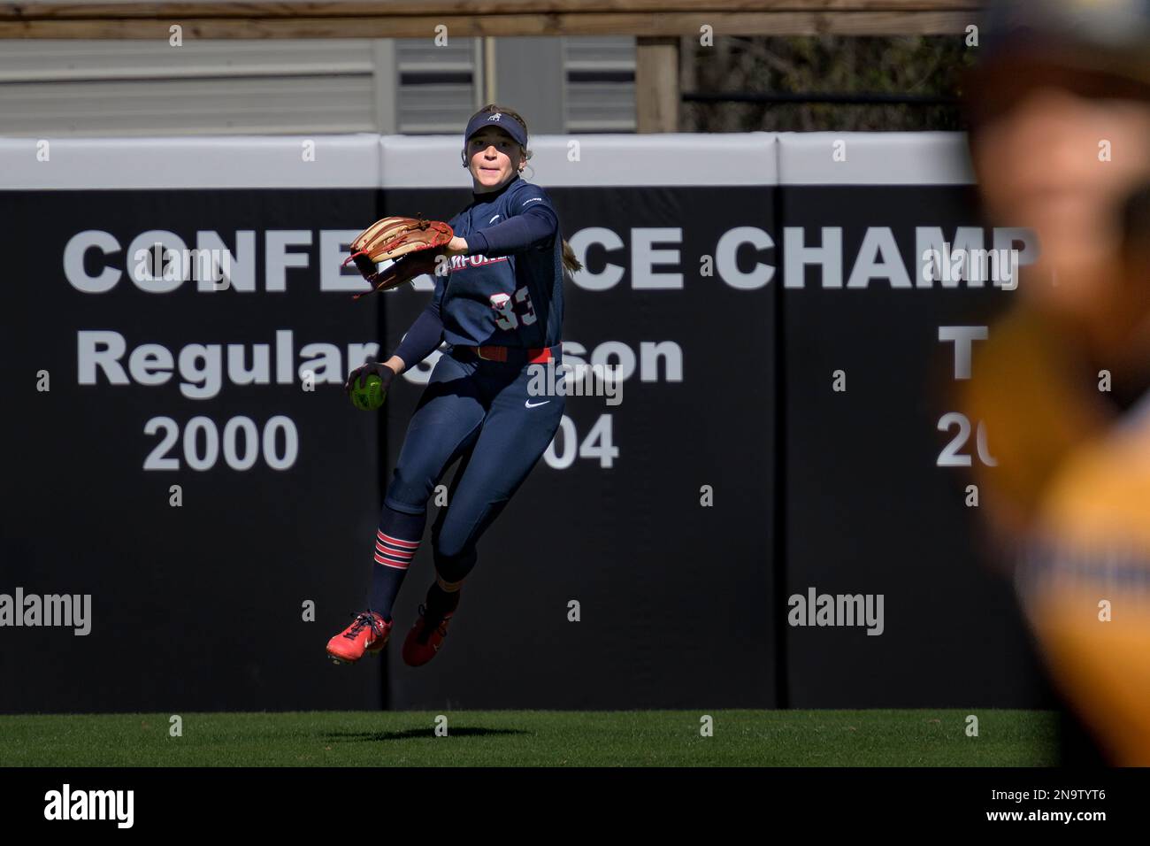 Samford outfielder McKayla Cothran (33) throws back to the infield ...