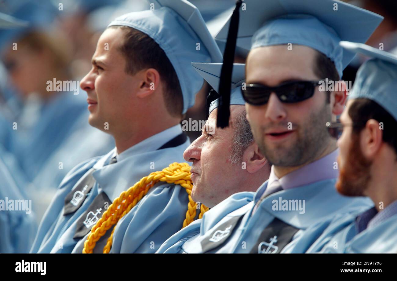 Columbia University janitor Gac Filipaj, center, watches during the ...