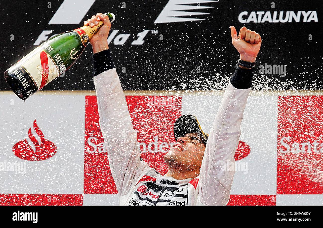 Williams driver Pastor Maldonado, from Venezuela, celebrates his ...