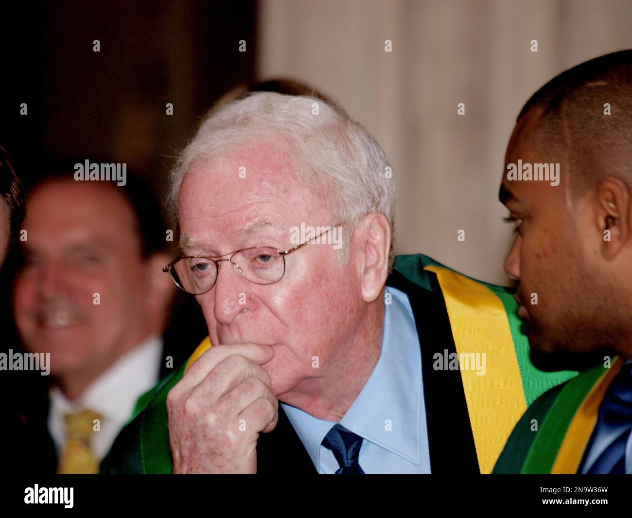 British actor Sir Michael Caine, left, istens to Lance Corporal Johnson ...