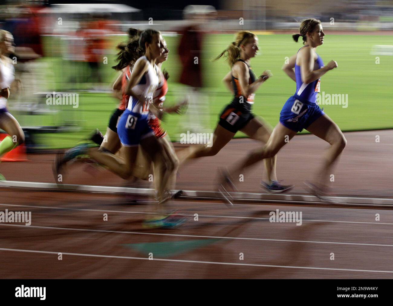 Brock's Kamy Cole, right, competes in the Conference 2A girls 1600 ...