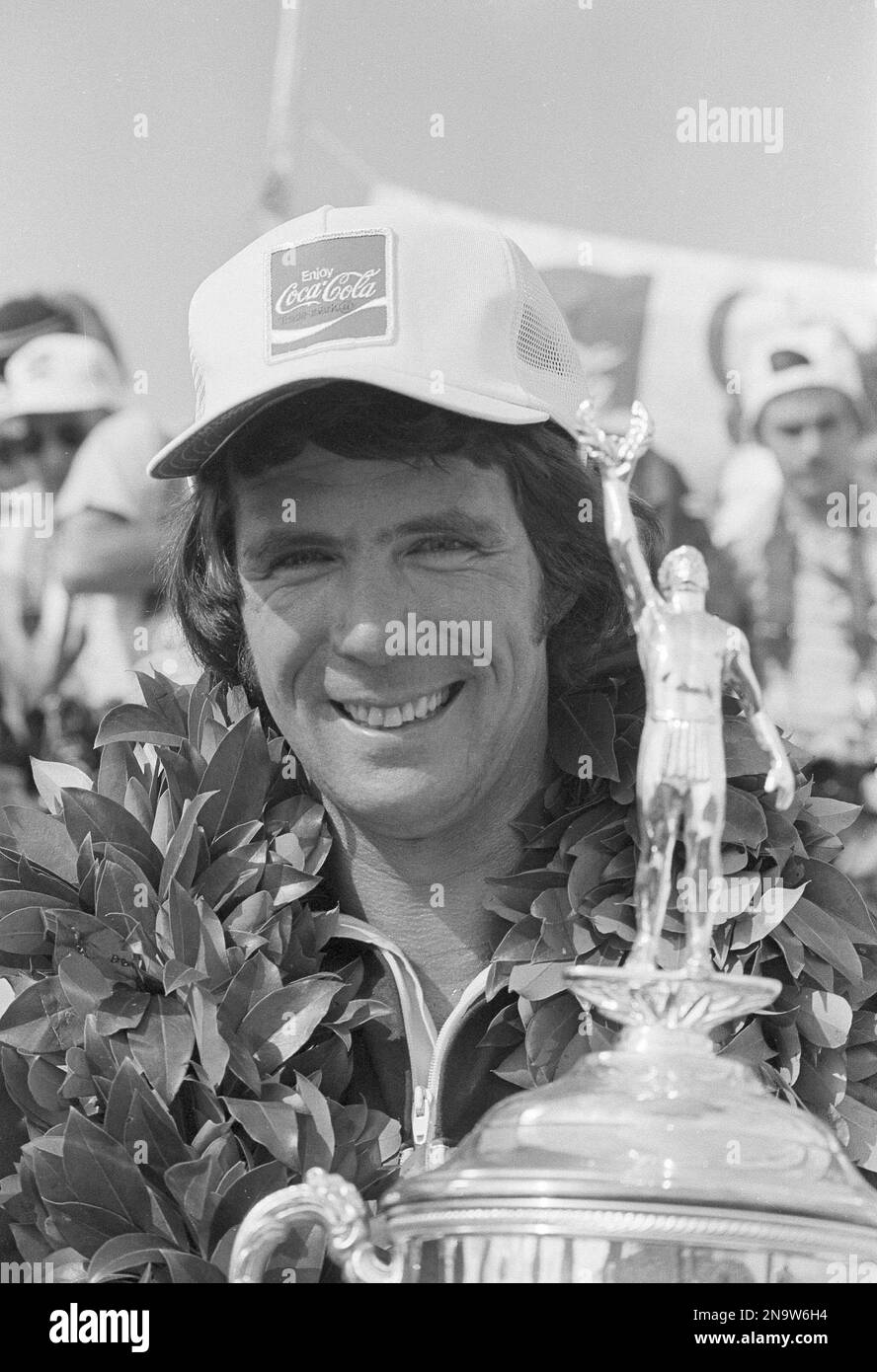 Darrell Waltrip of Franklin, Tenn., is all smiles wearing a victor's ...