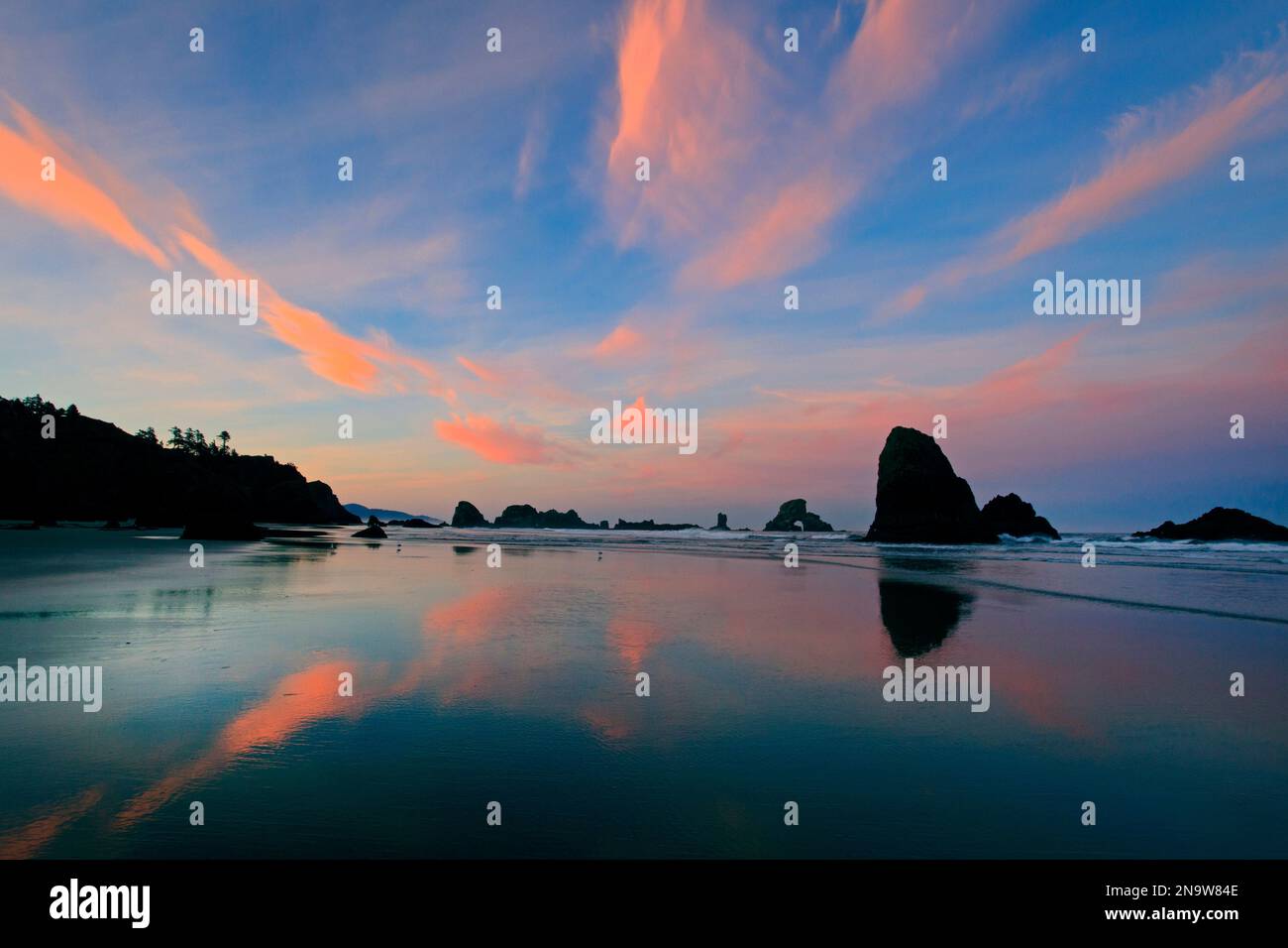 Beautiful sunrise over rock formations at Indian Beach on the Oregon ...