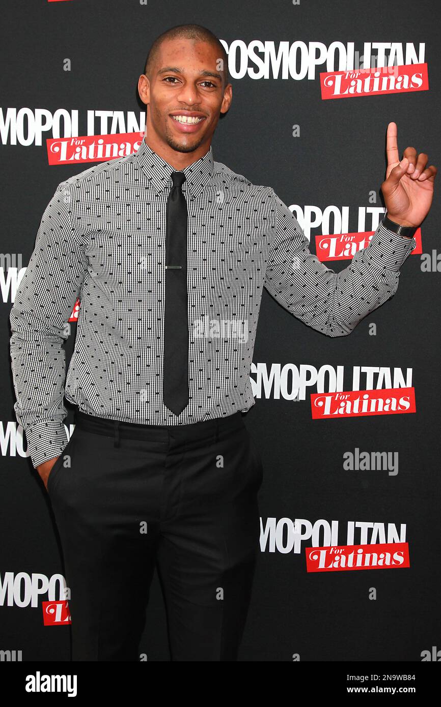 In this May 9, 2012 photo, New York Giants football player Victor Cruz ...