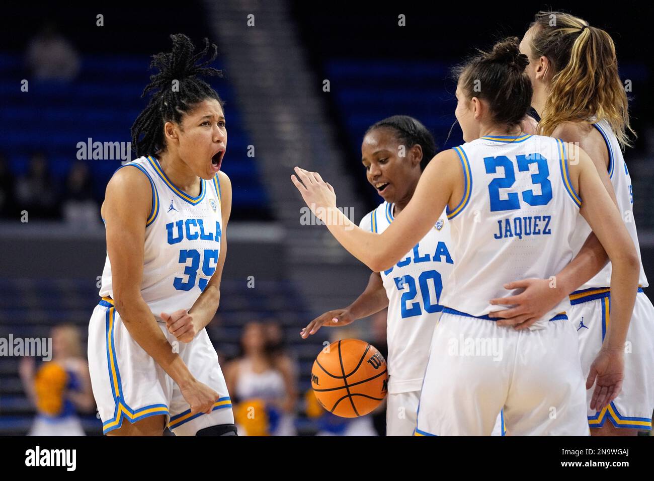 UCLA guard Camryn Brown, left, celebrates with teammates guard Charisma ...
