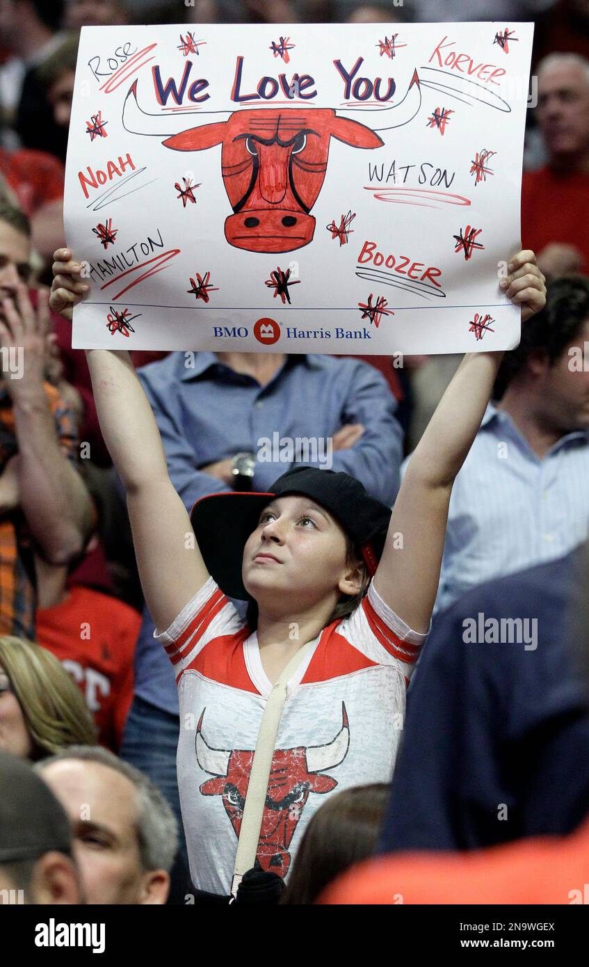 A Chicago Bulls fan holds a sign during the second quarter of Game 5 in ...