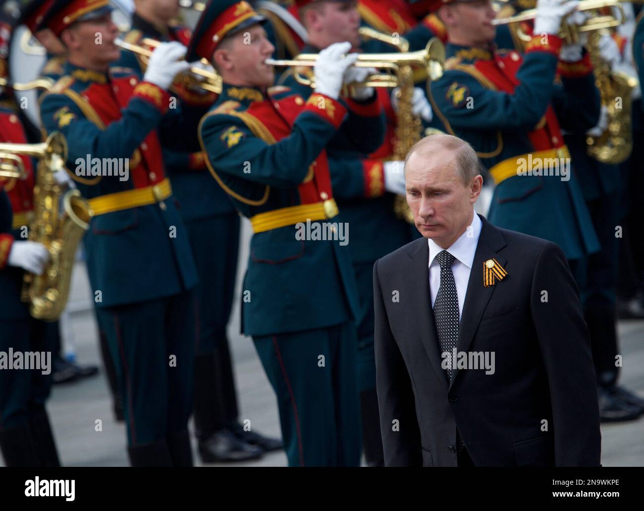 Russian President Vladimir Putin attends a wreath laying ceremony at ...