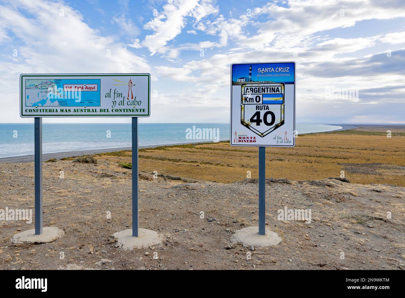 View to the coast of Cabo Virgenes and aluminum signs marking kilometer ...