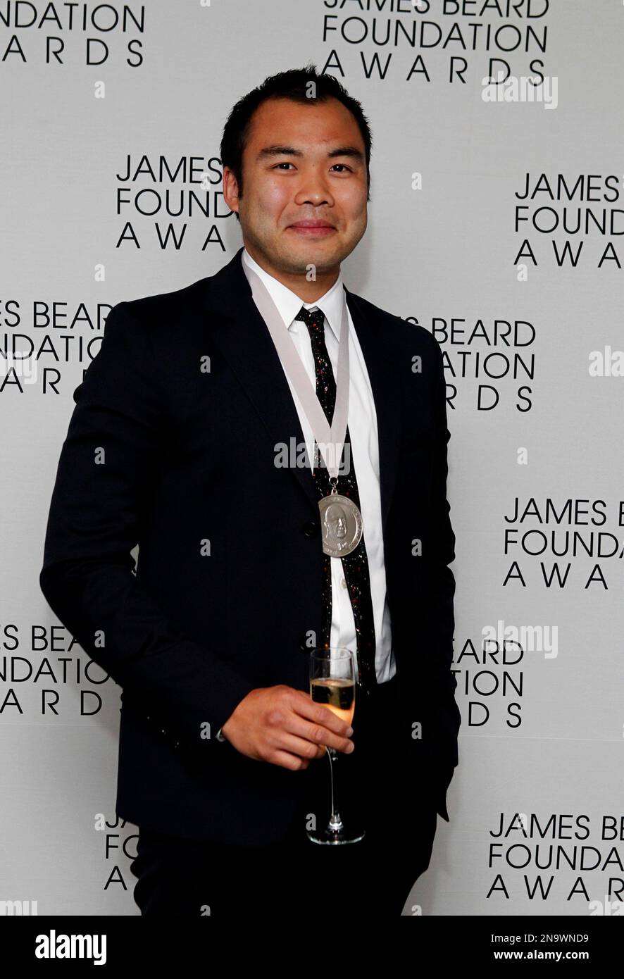 Chef Paul Qui poses with his medal for Best Chef: Southeast, during the ...