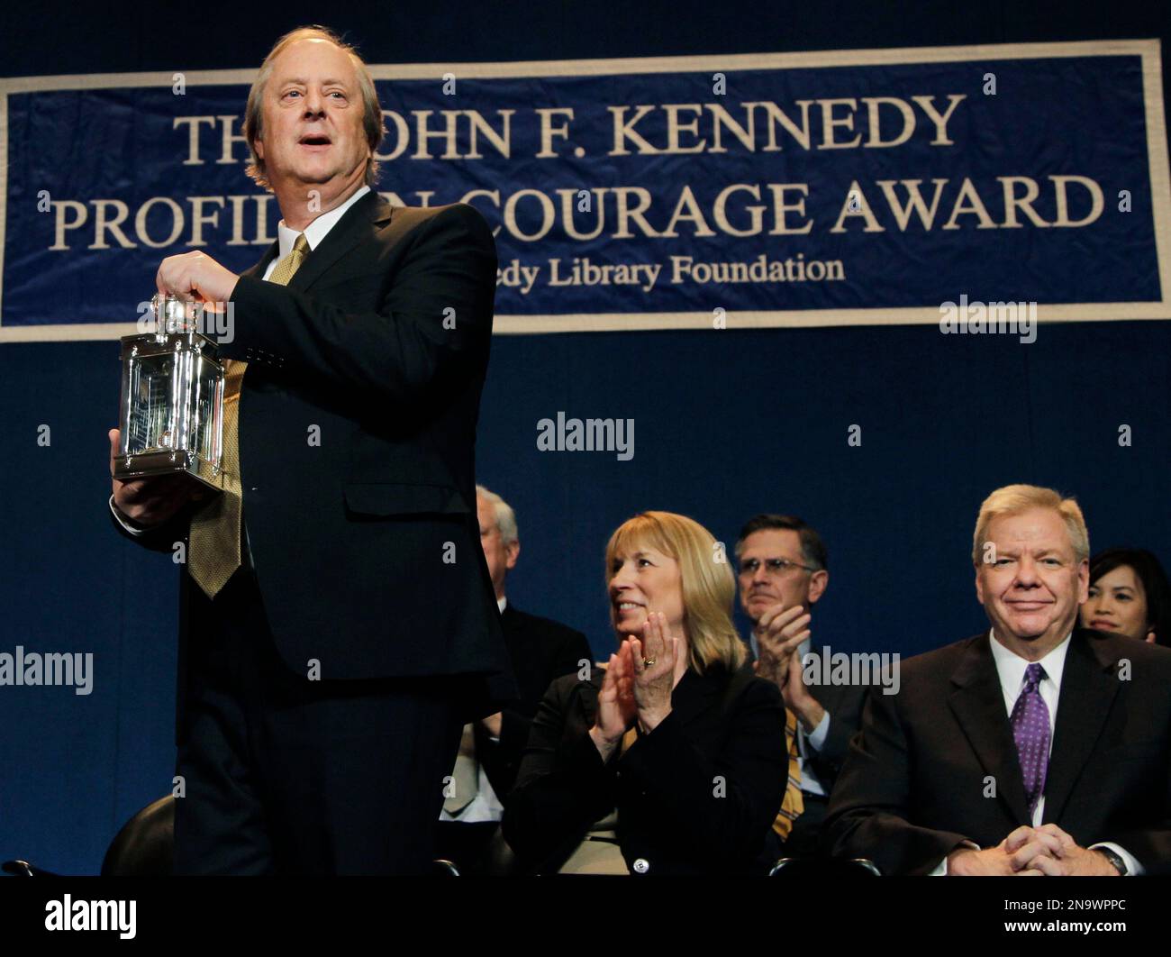 David Baker, former Iowa Supreme Court Justice, receives his lantern as ...