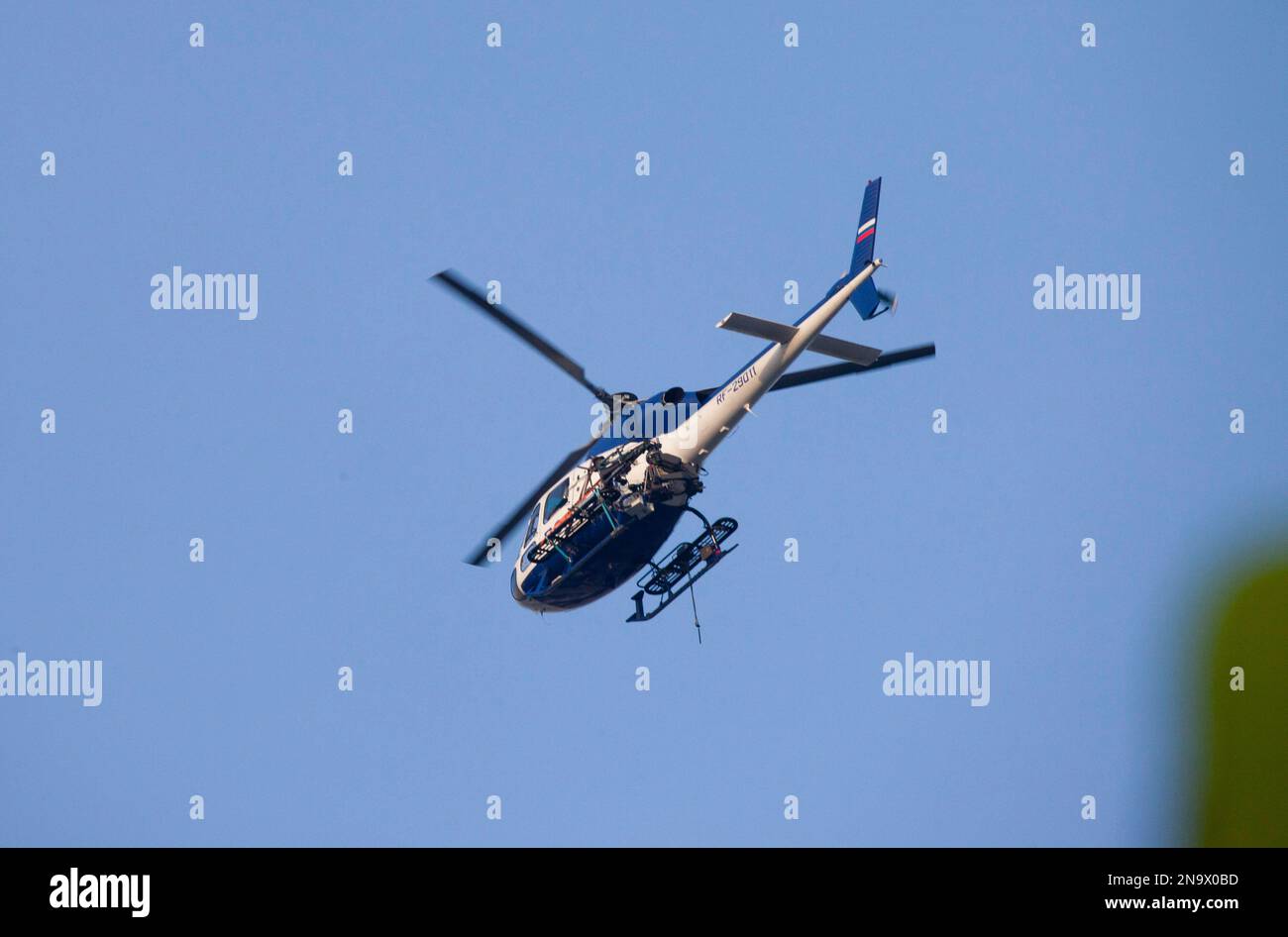 Russian Police helicopter flies over the center of Moscow during a ...