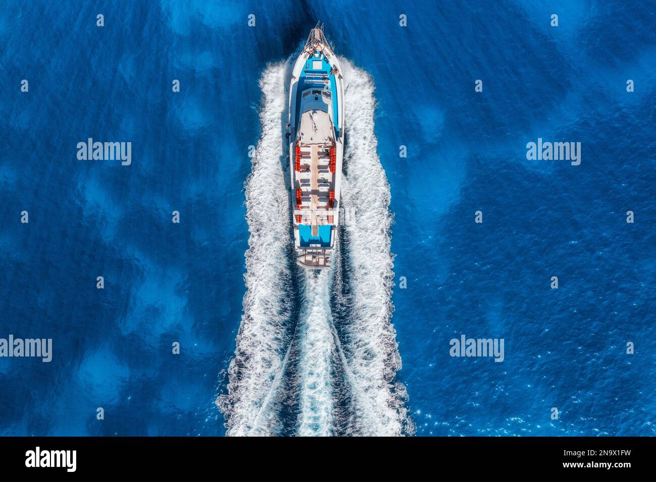 Aerial view of beautiful floating yacht in blue sea at sunny day Stock ...