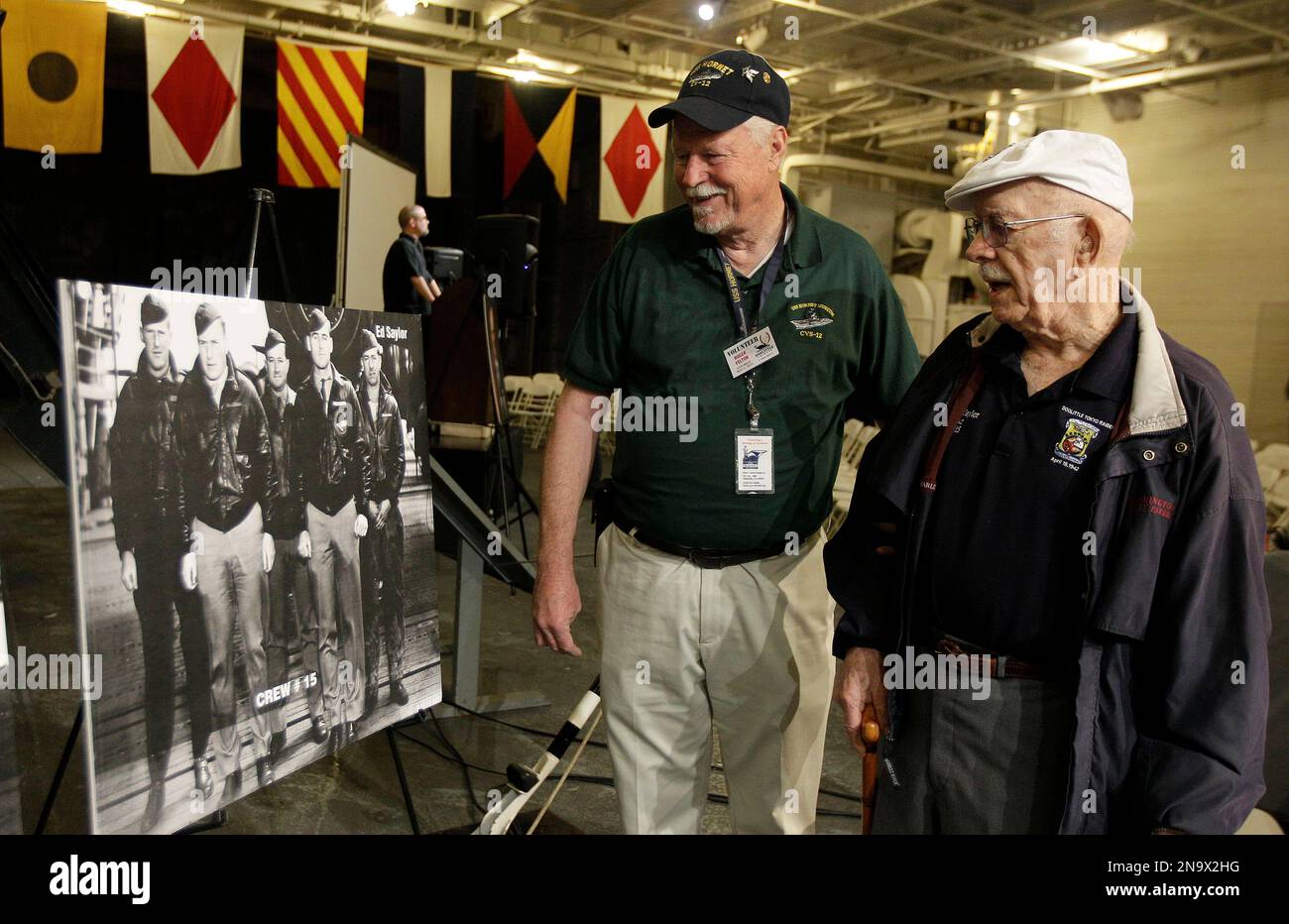Lt. Col. Edward Saylor, right, talks with USS Hornet volunteer Roger ...