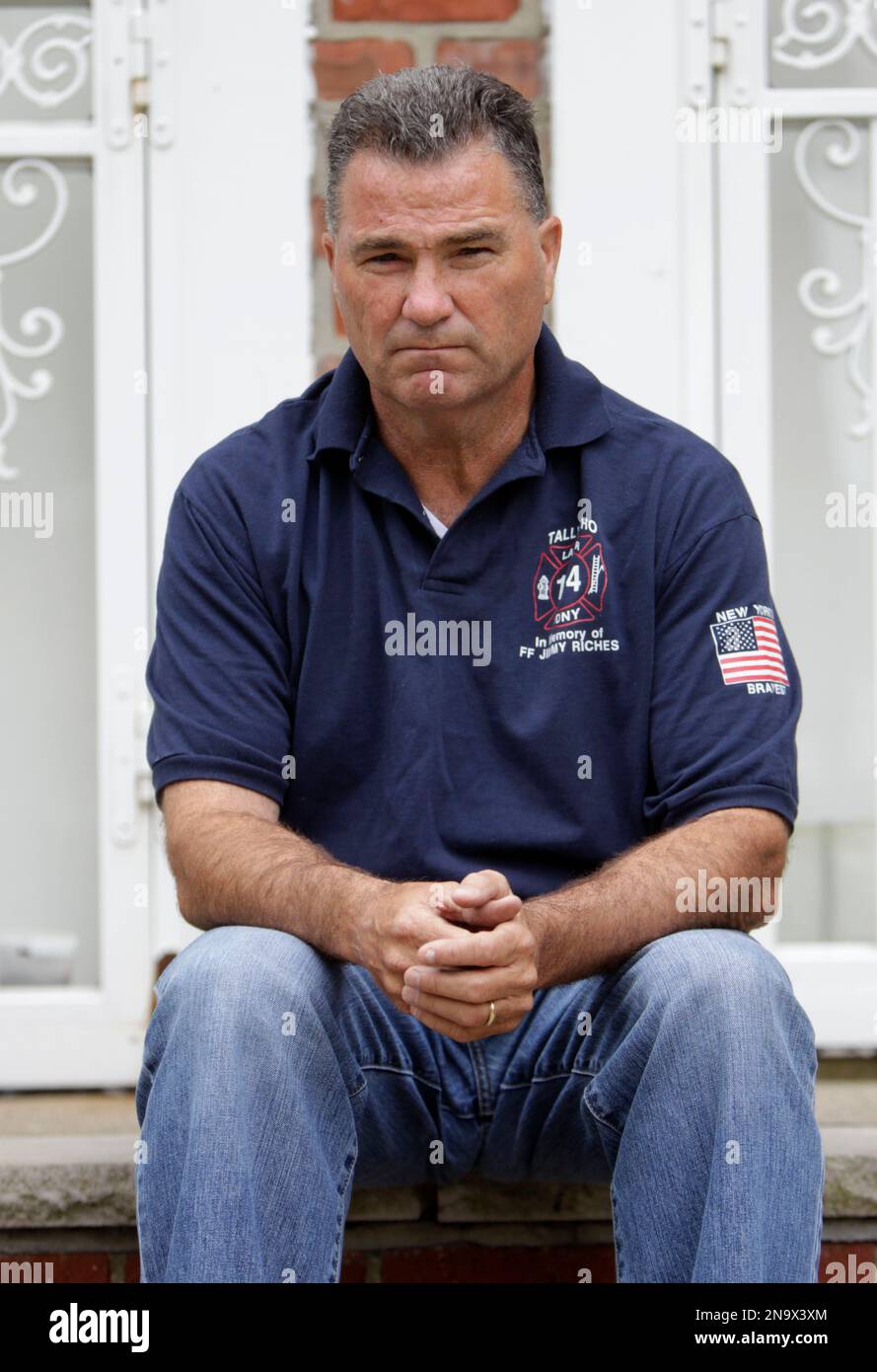 Retired firefighter Jim Riches poses for a picture near his home in New ...