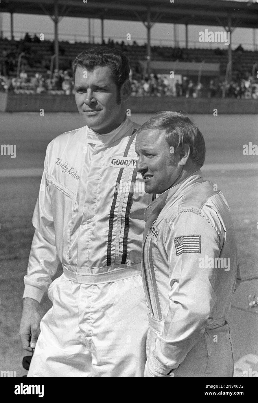 Buddy Baker, left, poses with Cale Yarborough after Cale won the pole ...