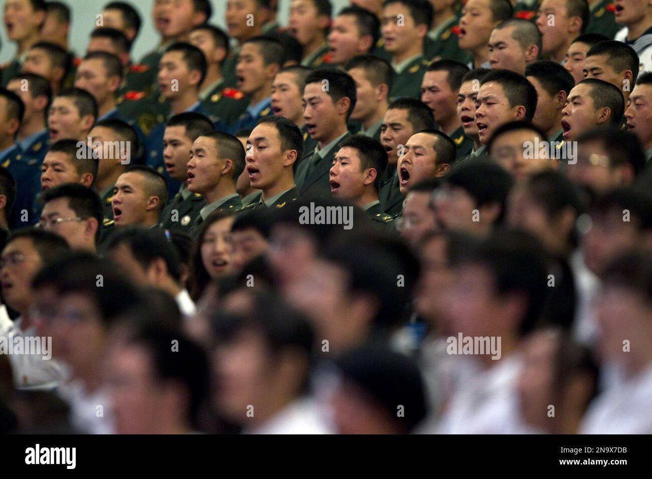 Chinese soldiers, students, and paramilitary police, the members of the ...