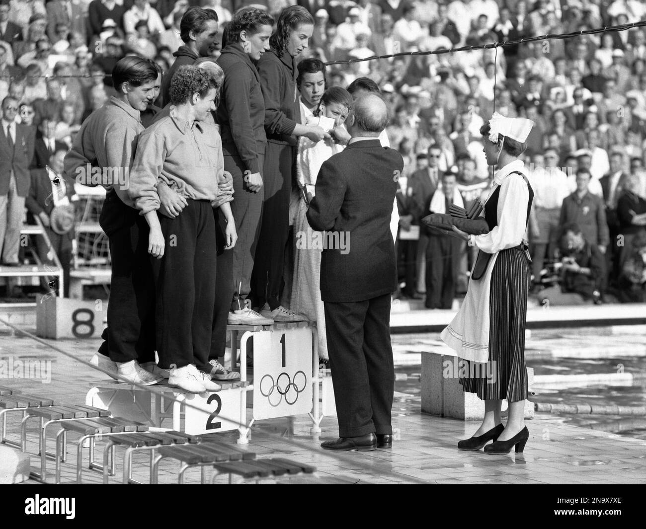 The Hungarian Women's 4 x 100 Meter Swim Relay team receive their gold ...