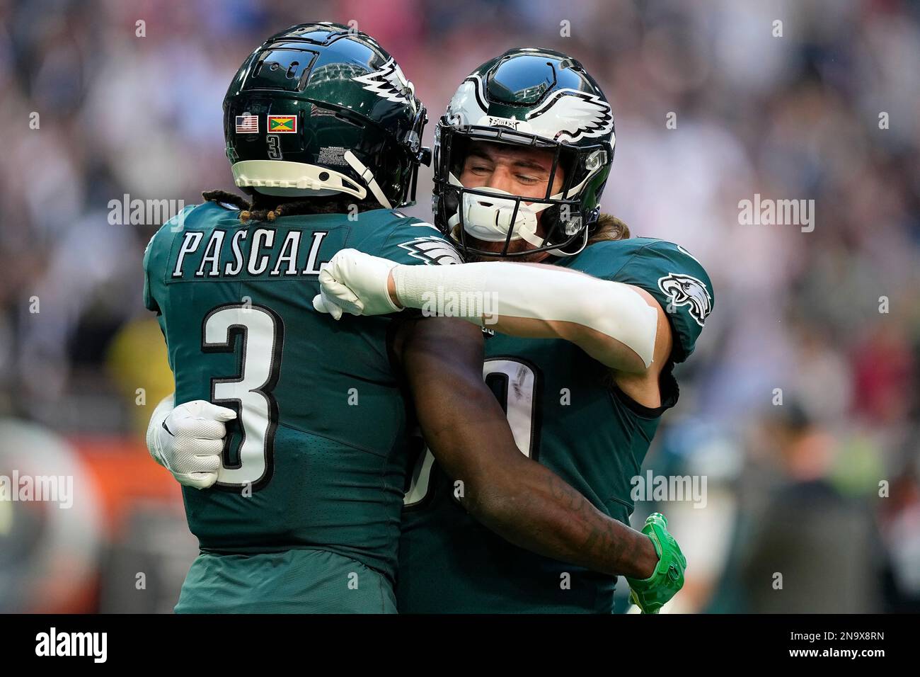 Philadelphia Eagles wide receiver Zach Pascal (3) embraces tight end ...