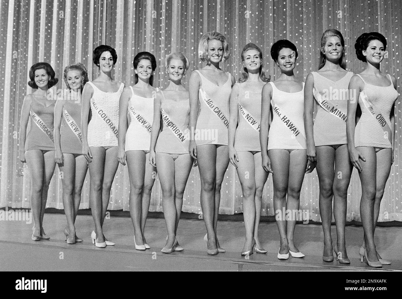 Ten semi-finalists of the Miss America pageant pose in their swimsuits ...