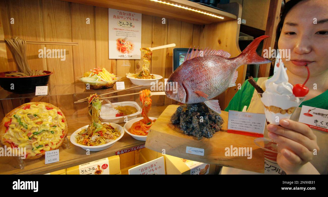 Japan's fake food sample maker Iwasaki Be-I Co. employee Ayano Kikuchi ...