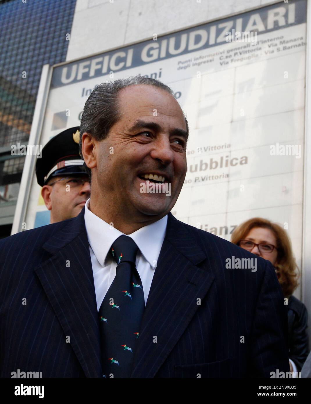 Former PM and Italia dei Valori leader Antonio Di Pietro smiles as he ...