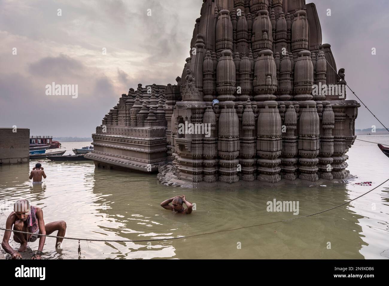 Pilgrims performing morning puja in the Ganges; Varanasi, India Stock ...