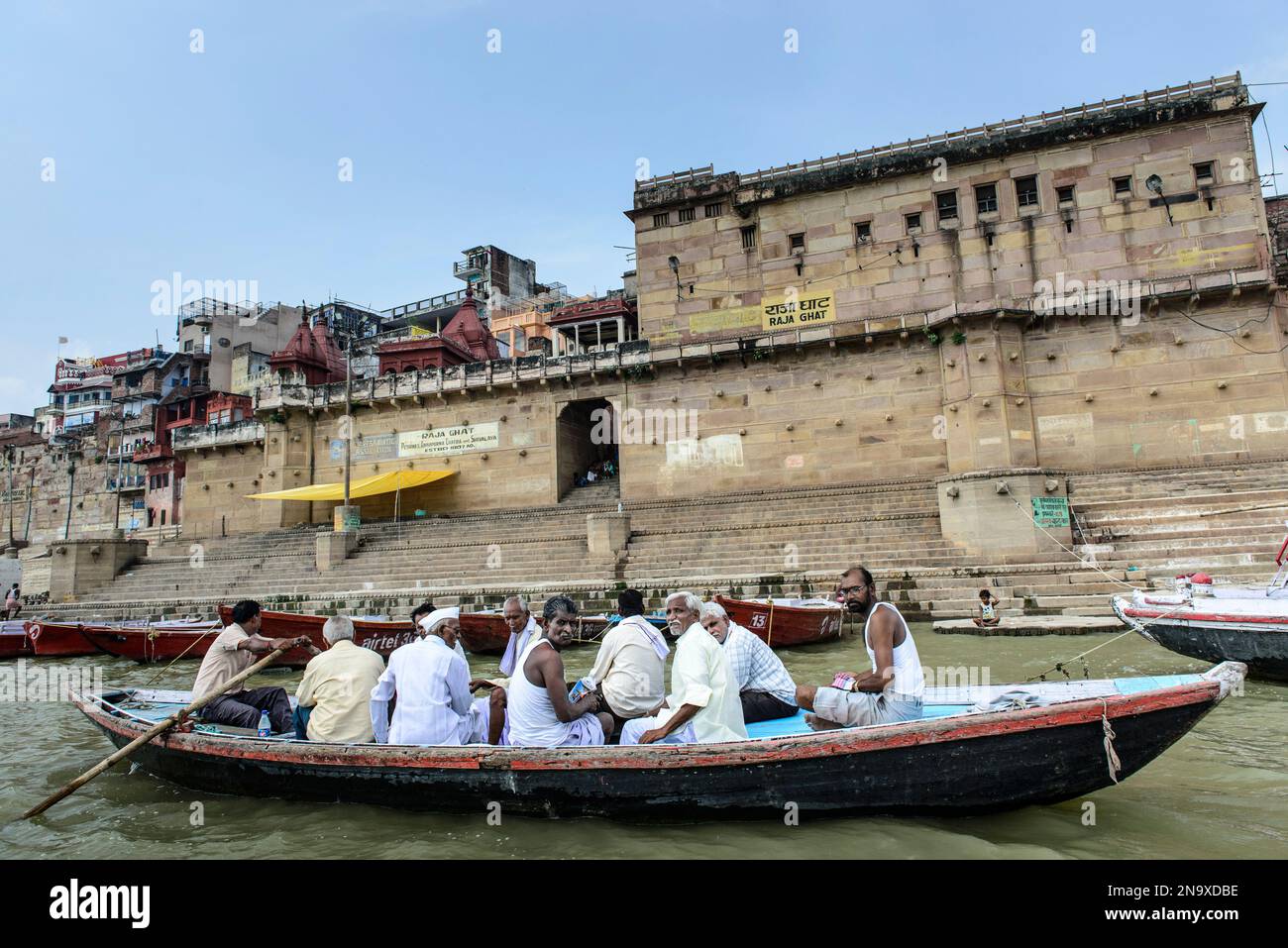 Pilgrims in rowing boat on the Ganges; Varanasi, India Stock Photo - Alamy