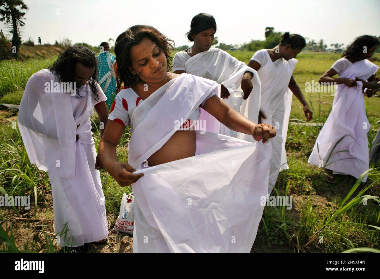 Indian eunuchs wear white sarees signifying widowhood as they re-enact ...