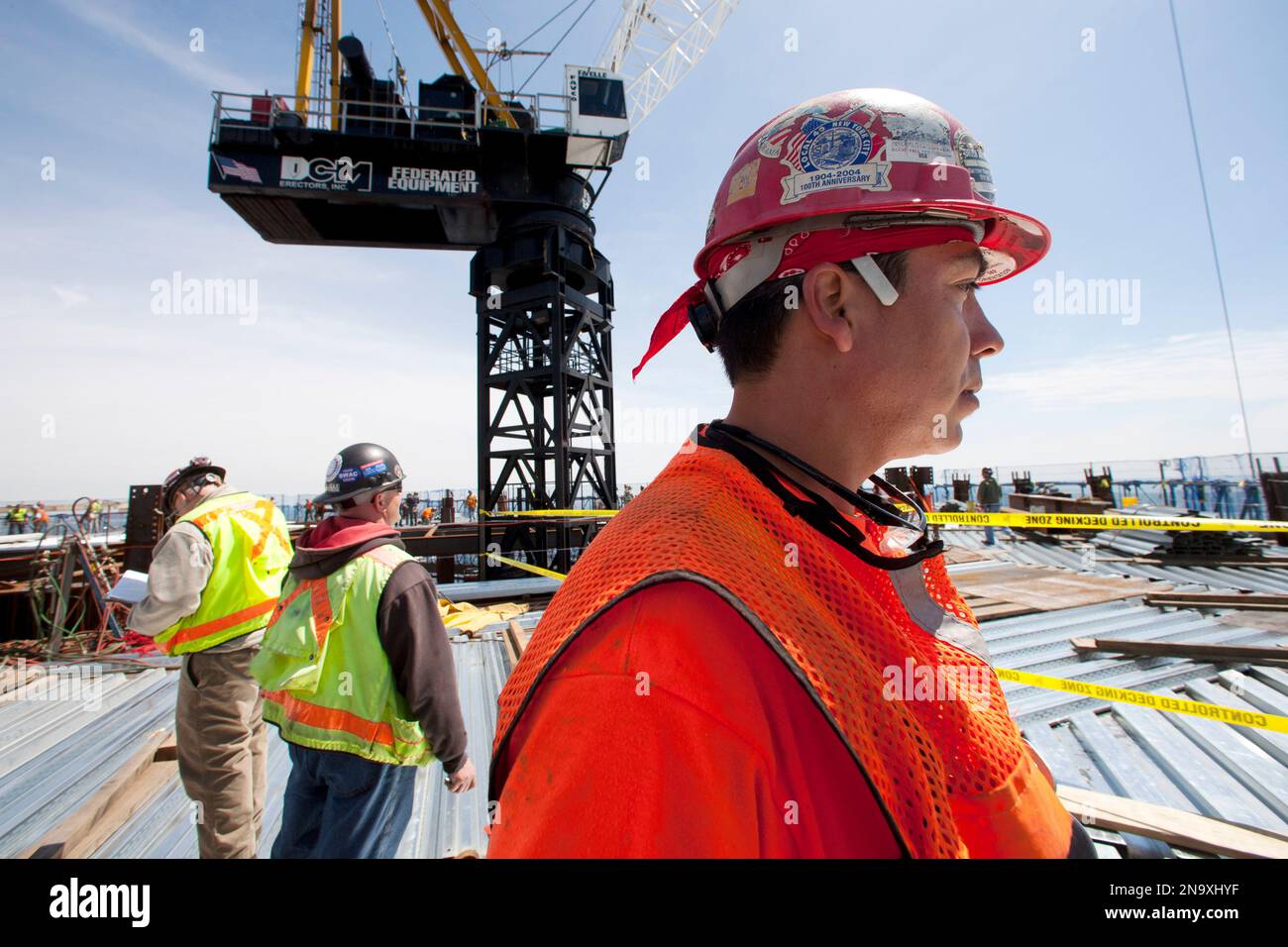 Ironworker Steven Cross, right, at One World Trade Center on the day it ...