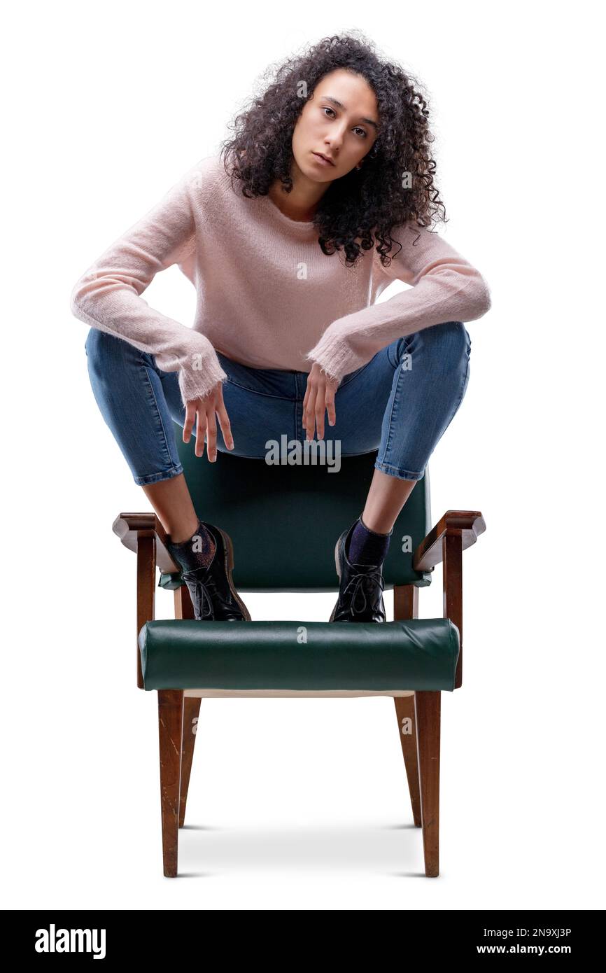 Woman wearing pink sweater jeans Cut Out Stock Images & Pictures - Alamy