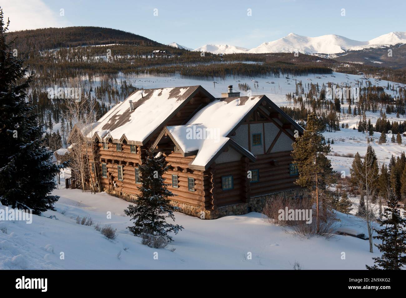 Snow-covered log cabin near Denver, Colorado, USA; Denver, Colorado ...