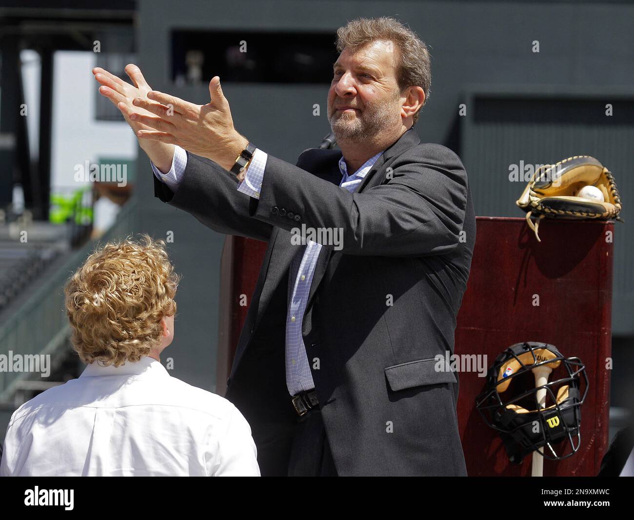 Former Giants executive Corey Busch, right, gestures as he thanks ...