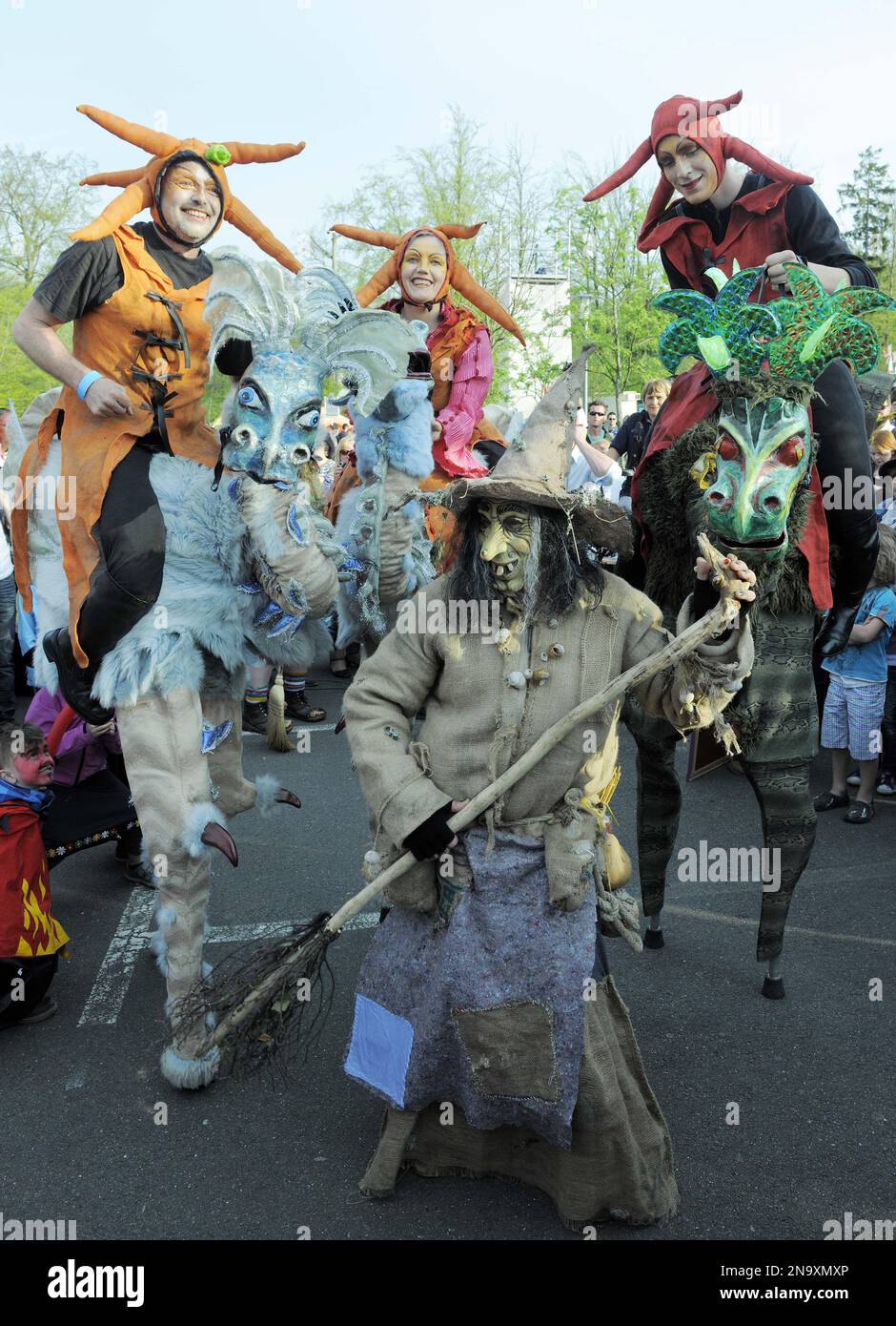 Artists dance during the Walpurgis Night at the famous Hexentanzplatz ...