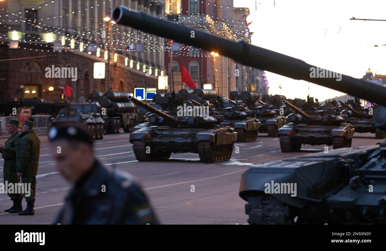 Russian army and police officers wait as tanks occupy Tverskaya street ...